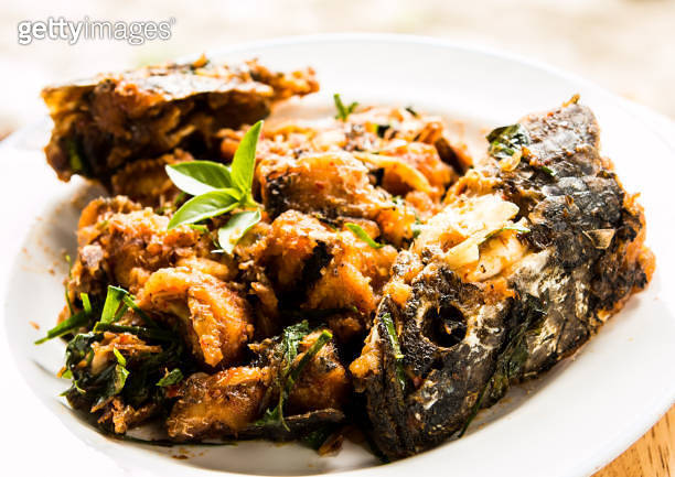 Fried chopped head snake fish with chili paste in plate 이미지 (1273822817 ...