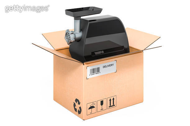 Electric meat grinder inside cardboard box, delivery concept. 3D ...