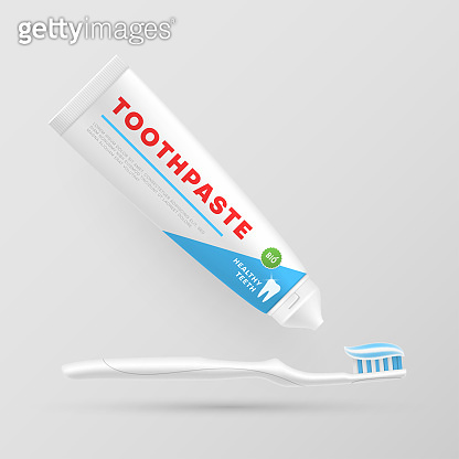 Toothpaste is squeezed out of tube onto toothbrush. Dental, oral ...