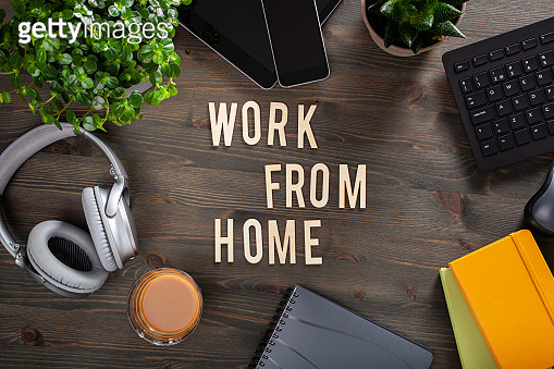 work from home text desk with keyboard computer smartphone notebook ...