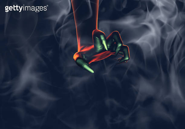 Halloween horror concept. Grabbing Scary hand with claws from darkness ...