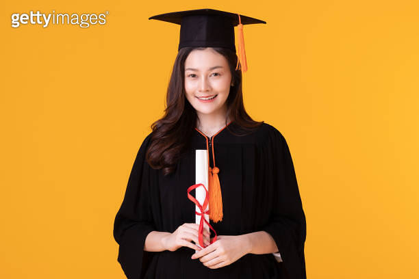 Happy Graduate asian woman in cap and gowm holding Certificated or ...