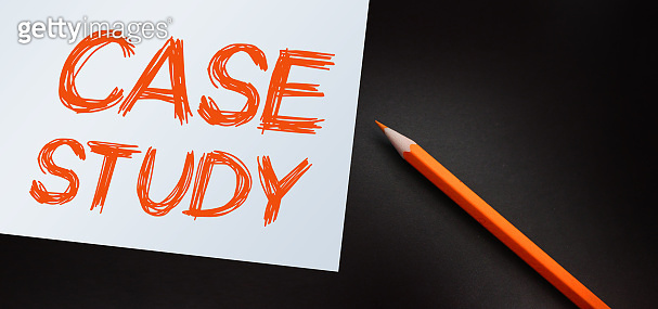Hand drawing Case study words on white piece of paper with orange ...