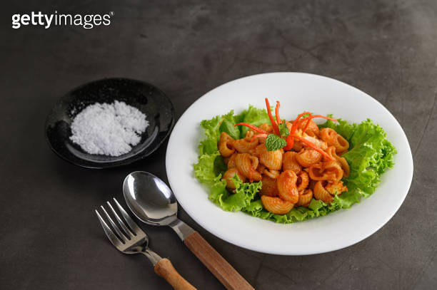 The pipe rigate italian pasta with tomato sauce and egg, chili and ...