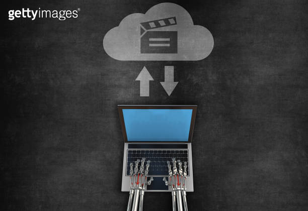 Cyborg using laptop with film slate cloud icon 이미지 (1216985980) - 게티이미지뱅크