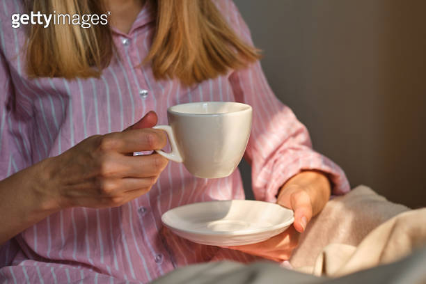 Beautiful woman with a cup of coffee. Businesswoman drink morning ...