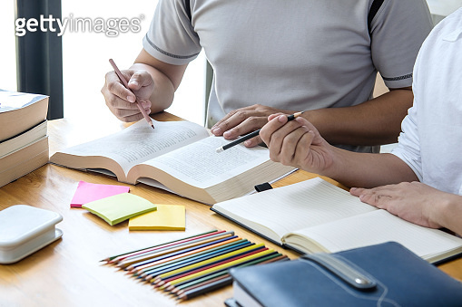 Education, teaching, learning, technology and people concept. Two high ...