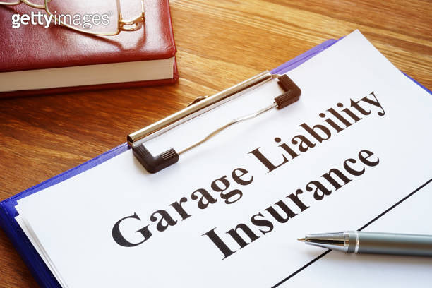 Garage Liability Insurance agreement and pen for signing. 이미지 ...