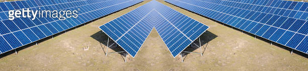 Blue panels of solar power plant in the backyard. Energy independence ...