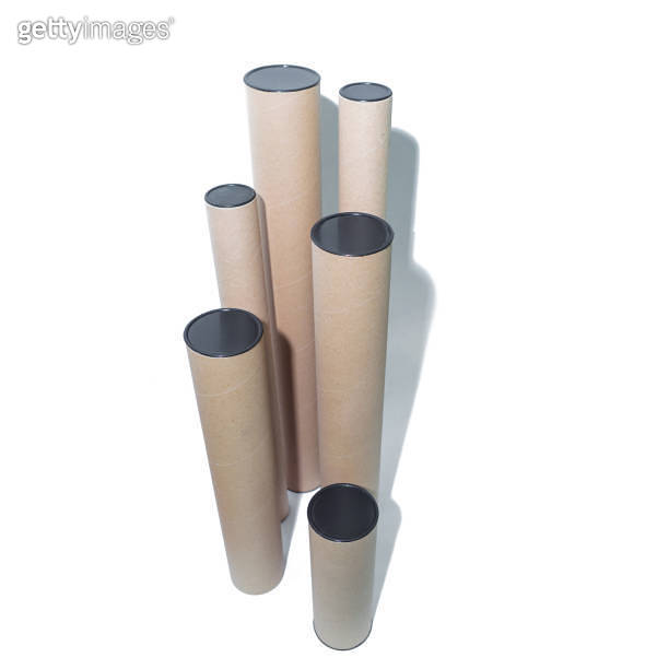 Paper tube cores, tissues isolated on white background, in industry ...