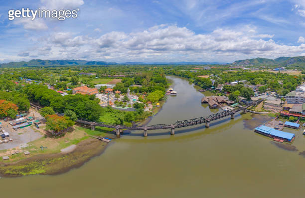 Aerial view of River Kwai Bridge with train rail way with Chao Phraya ...