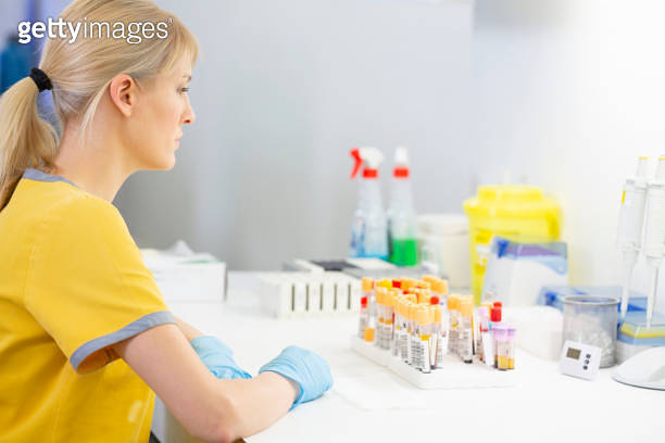 Women doctor in Medical laboratory working test with medical samples ...