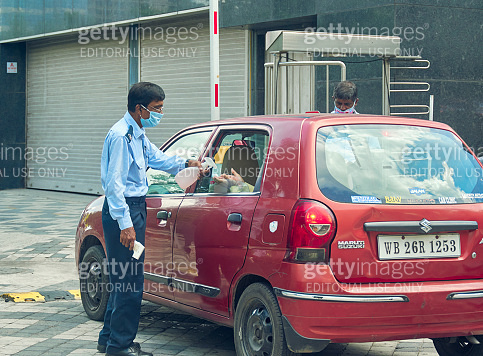 Security guards checking inbound vehicles at Saltlake sector V, Kolkata ...