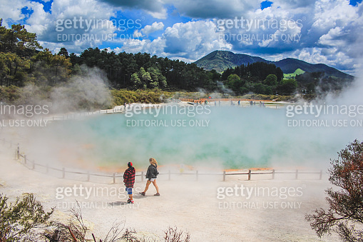 smoke is rising from Champagne Pool at famous Wai-O-Tapu Thermal ...