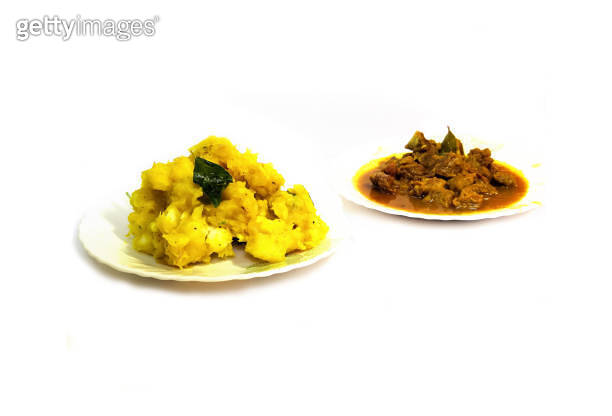 Kerala Style Cooked Tapioca And Beef Curry (1273366264) - 게티이미지뱅크