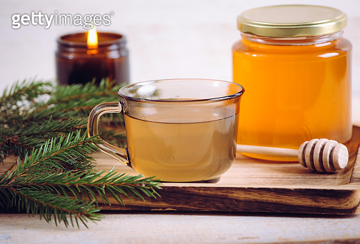 Spruce tree needle tea infusion with honey. Tree branches for ...