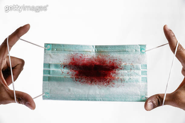 Hand holding mask with red blood stains from cough 이미지 (1214274505 ...