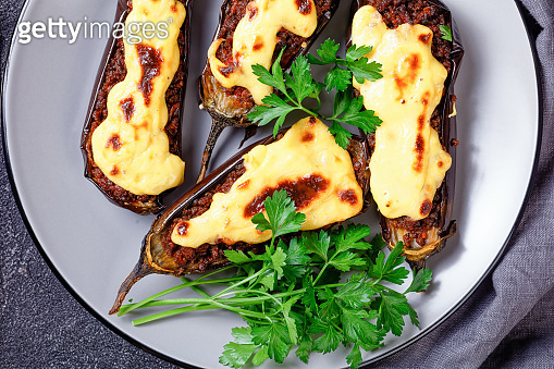 Papoutsakia dish of greek cuisine: baked stuffed eggplants with beef ...