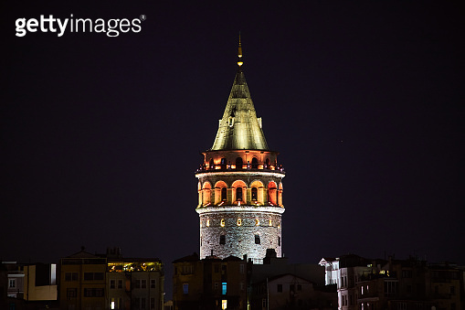 Galata Kulesi Tower at night in Istanbul, Turkey. Ancient Turkish ...