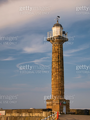The Grade 2 listed historic sandstone tower of the East Pier Lighthouse ...