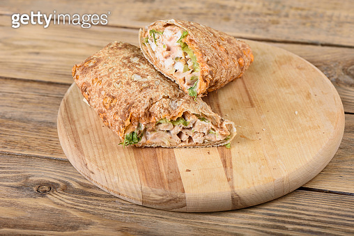 Shawarma Middle Eastern dish of pita bread, stuffed with grilled and ...