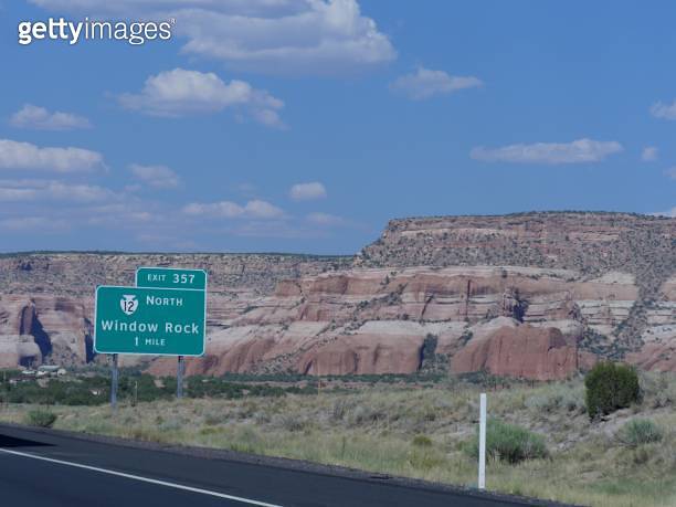 Directional roadside sign in Arizona with distance information to ...