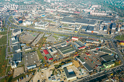 aerial panoramic view of city industrial district with manufacturing ...