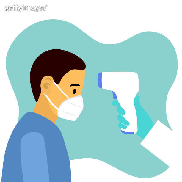 Measuring the temperature of a man with medical digital infrared ...