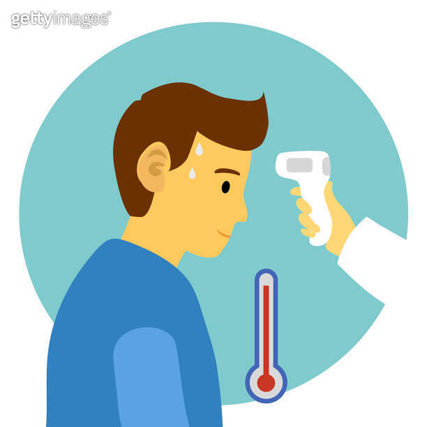 Measuring the temperature of a man with medical digital infrared ...