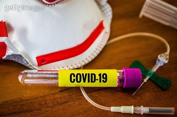 Blood test with mouthmask and cannula and blood tubes for the Corona ...