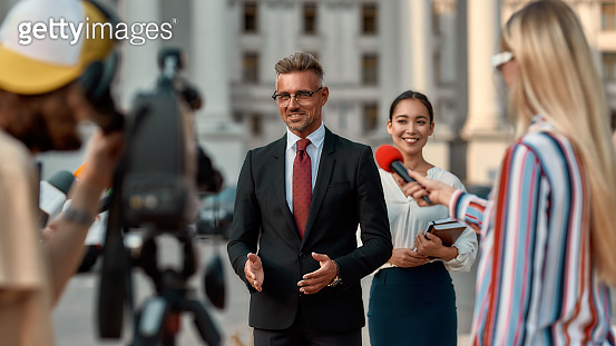 Expect more. Journalists conducting interview of politician. Journalism industry, live streaming ...