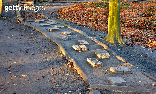 Tactile path for bare feet awakens the senses and uneven endings on the ...
