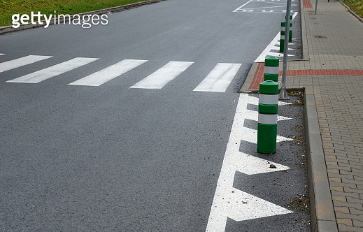 road signs drawn on the road side. zebra where he must not stop and ...
