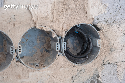 World standards set. wires outlet and connectors conduit on wall for ...