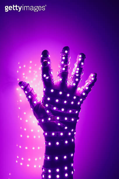 human hand covered with purple led lights, illuminated background 이미지 ...