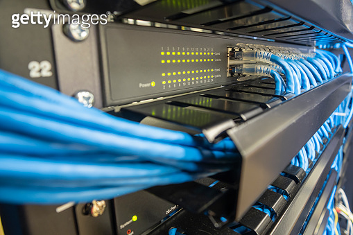 Network switch hub in rack cabinet. Network connection technology ...