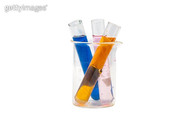 Beaker with color liquid. Solution chemistry. Laboratory beaker with ...