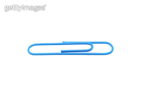 Single blue paper clip (horizontal style) on a white background. One ...