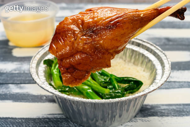 side view fast food roasted duck thigh with cabbage and rice horizontal ...