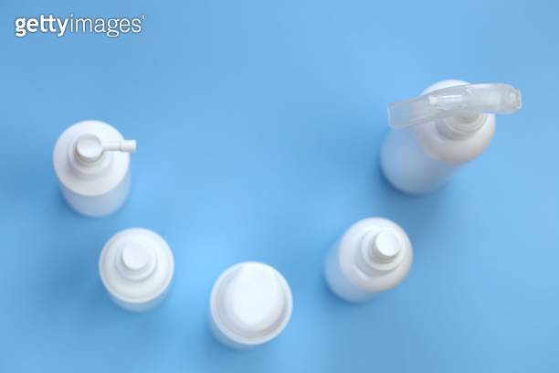 Disinfectant Bottle Set. Hand disinfection concept. White bottles on a ...