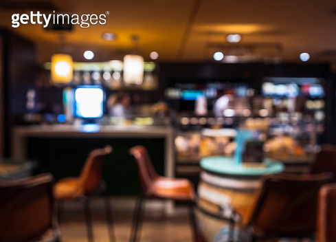 Blur Bar Nightclub Interior Table and seats with people drinking ...