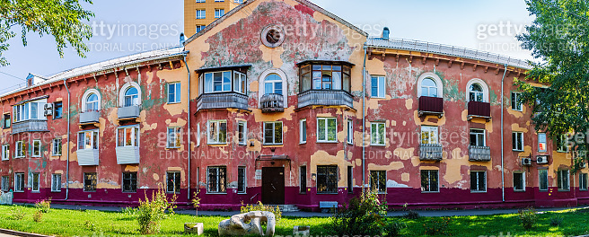 Old three-story house with a shabby facade on Profinterna Street ...