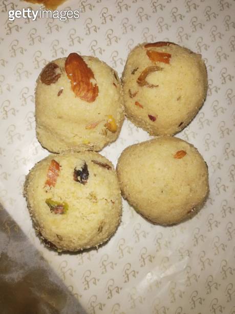 Sweets with coconut powder and dry fruits 이미지 (1278795199) - 게티이미지뱅크