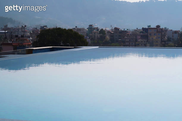 Image of rooftop infinity pool, swimming pool with skyline view of ...