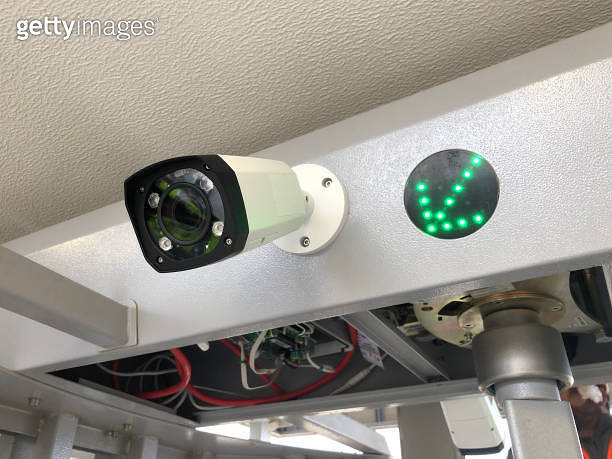 IP camera and green arrow indicator on turnstile 이미지 (1204398431) - 게티이미지뱅크