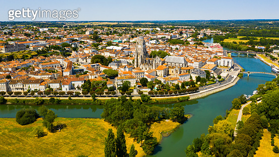Aerial view of Saintes on Charente river with medieval cathedral ...