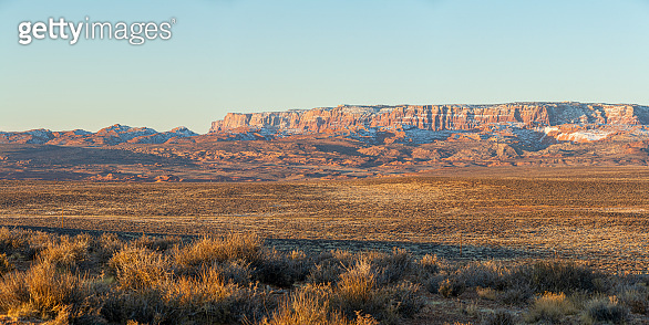 Panorama image of the morning light striking the cliffs of Vermilion ...