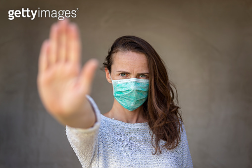Woman wearing face protection mask 이미지 (1216790823) - 게티이미지뱅크