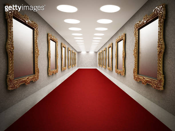 Elaborate vertical picture frames or mirrors arranged along the ...