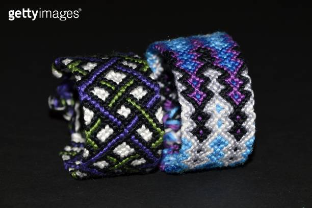 Colorful and multi-colored friendship bracelets handmade of embroidery ...